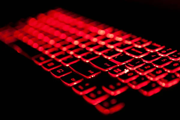Gaming laptop keyboard red backlight with selective fockus. - Stock ...