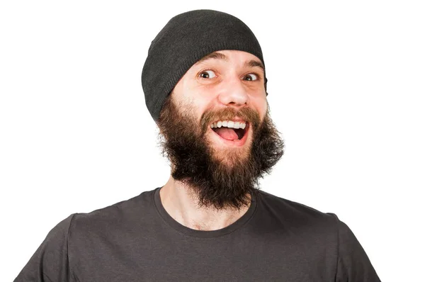 Young funny guy with beard in hat laughs. Isolated on white background ...