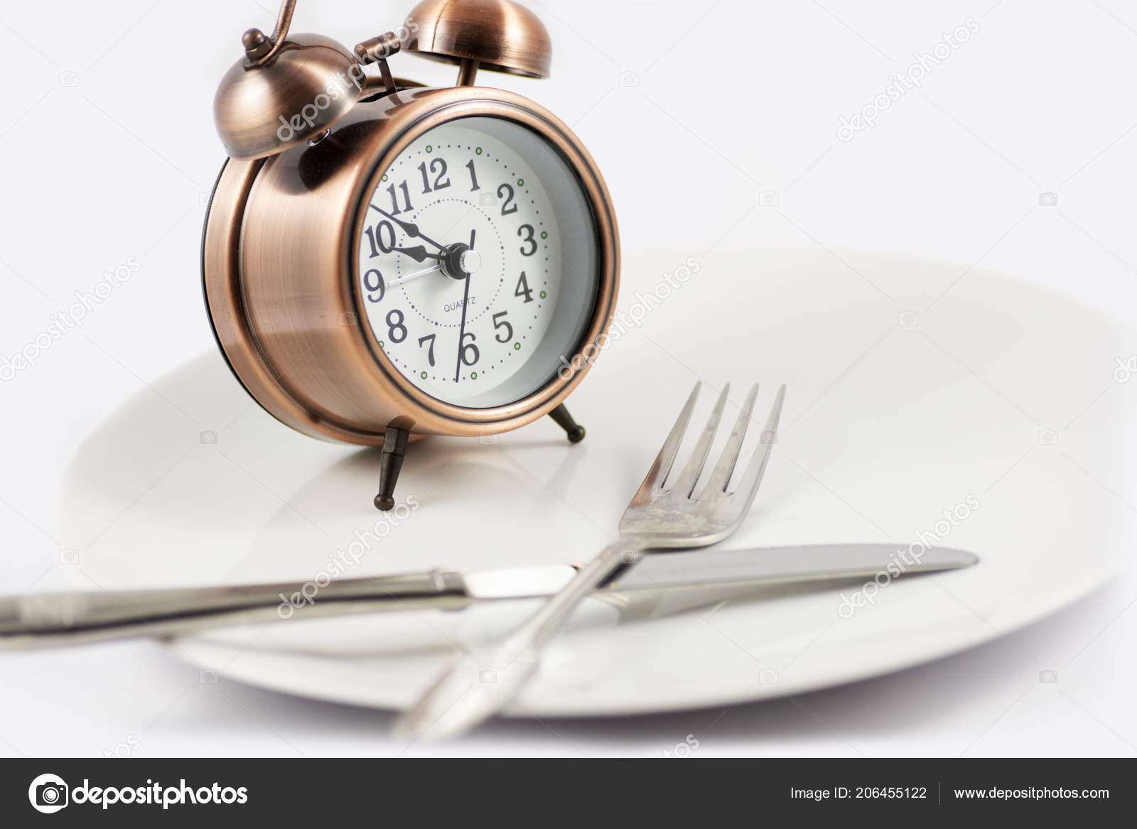 Copper Look Clock Knife Fork White Background Stock Photo by ©araelf ...