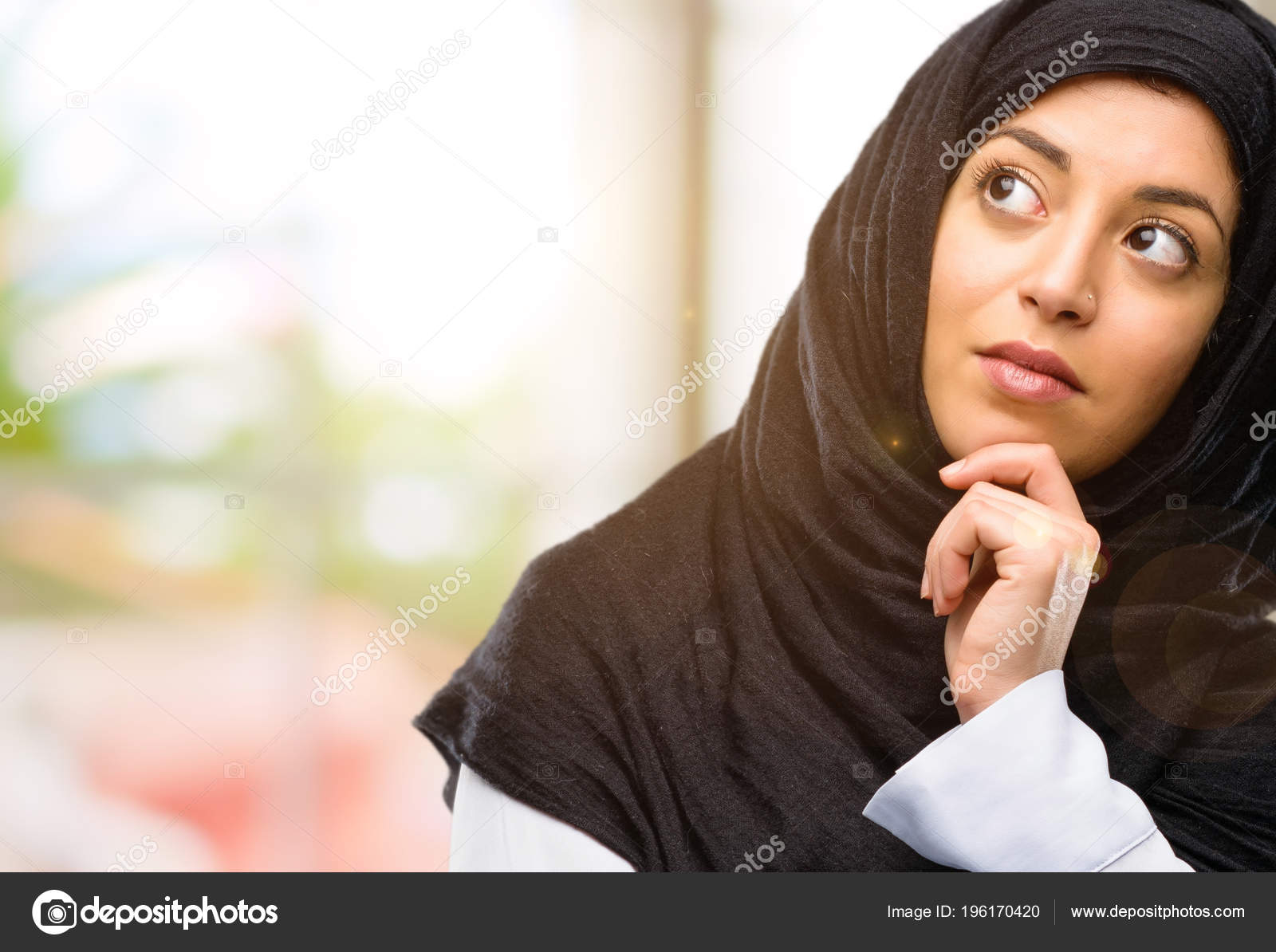 Young Arab Woman Wearing Hijab Thinking Looking Expressing Doubt Wonder ...