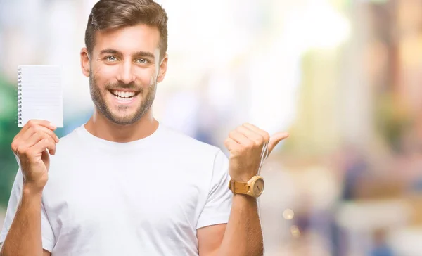 Man holding notebook Stock Photos, Royalty Free Man holding notebook ...