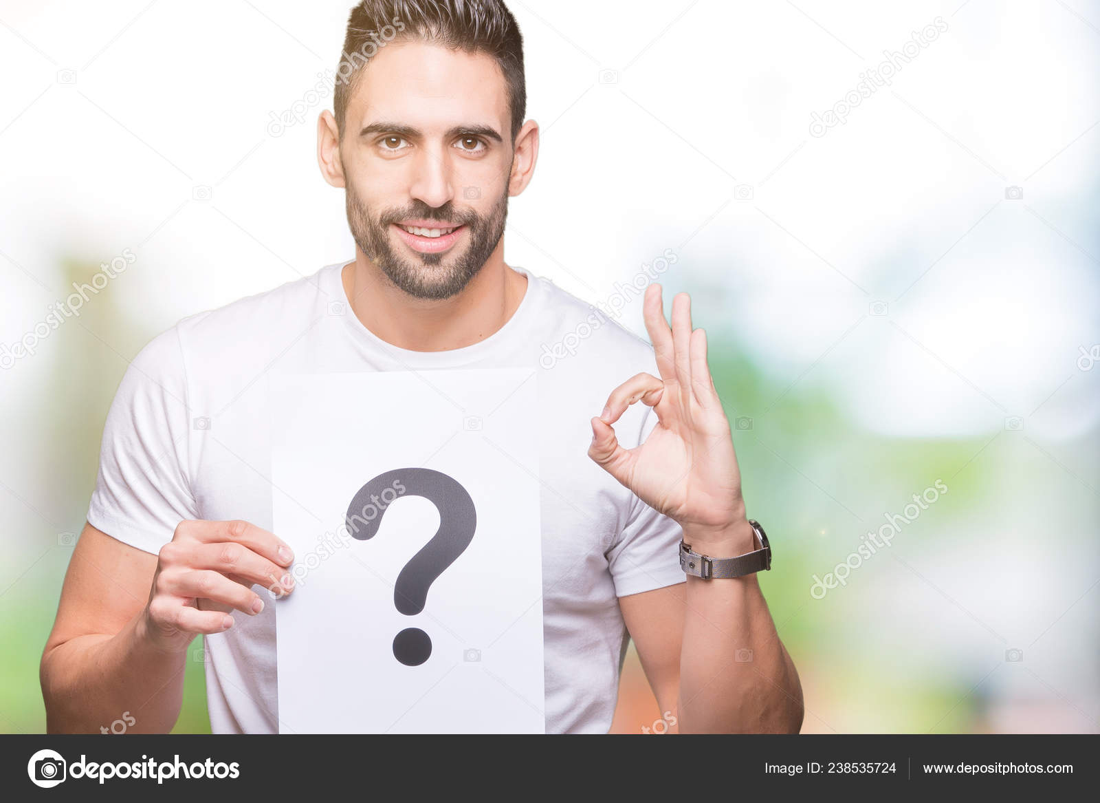 Handsome Young Man Holding Paper Question Mark Isolated Background ...