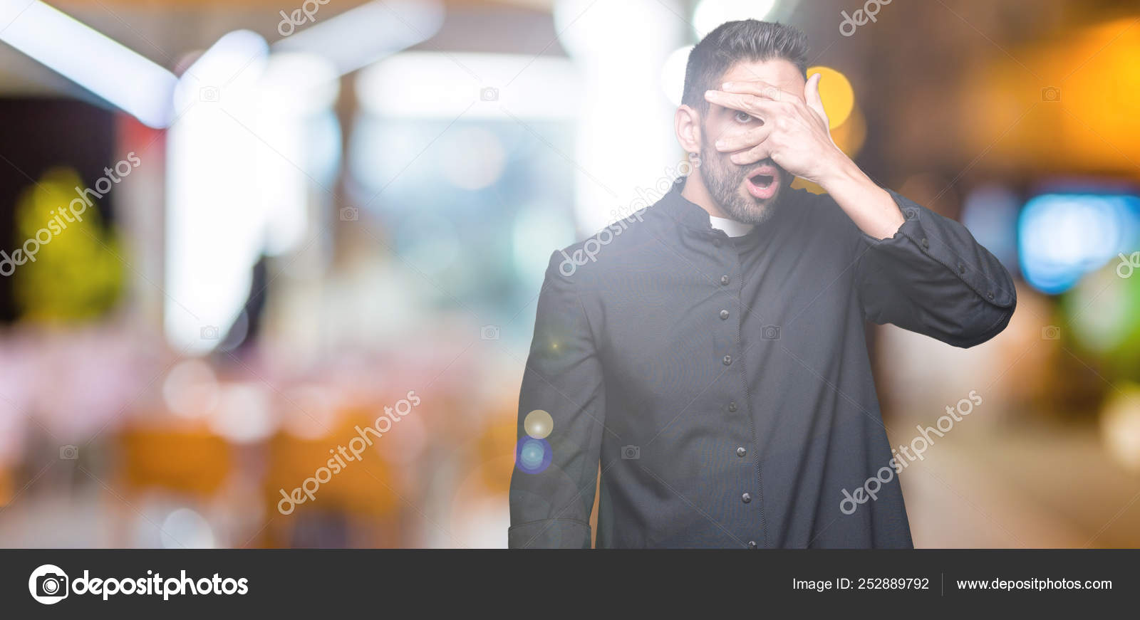 Young Christian Priest Isolated Background Peeking Shock Covering Face ...