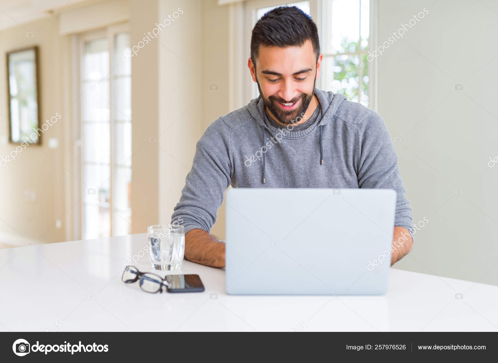 Man smiling working using computer laptop — Stock Photo © Krakenimages ...