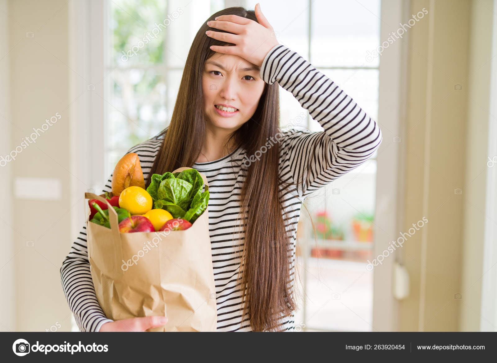 Beautiful Asian Woman Holding Paper Bag Fresh Groceries Stressed Hand