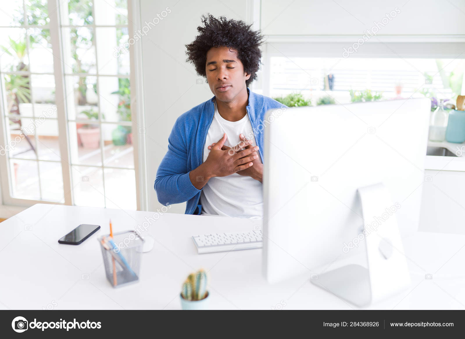 African American Man Working Using Computer Smiling Hands Chest Closed ...