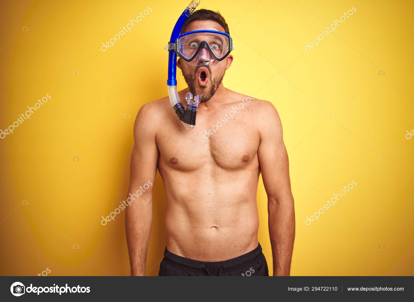 Young Handsome Shirtless Man Wearing Diving Goggles Isolated Yellow ... Young Handsome Shirtless Man Wearing Diving Goggles Isolated Yellow ...