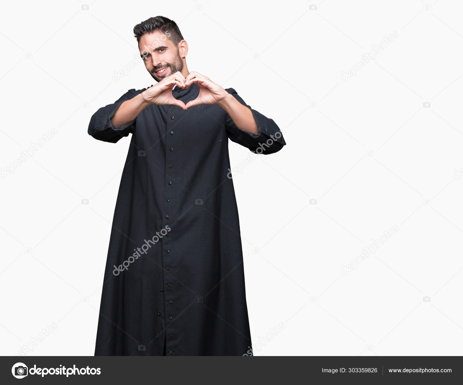 Young Christian Priest Isolated Background Smiling Love Showing Heart ...