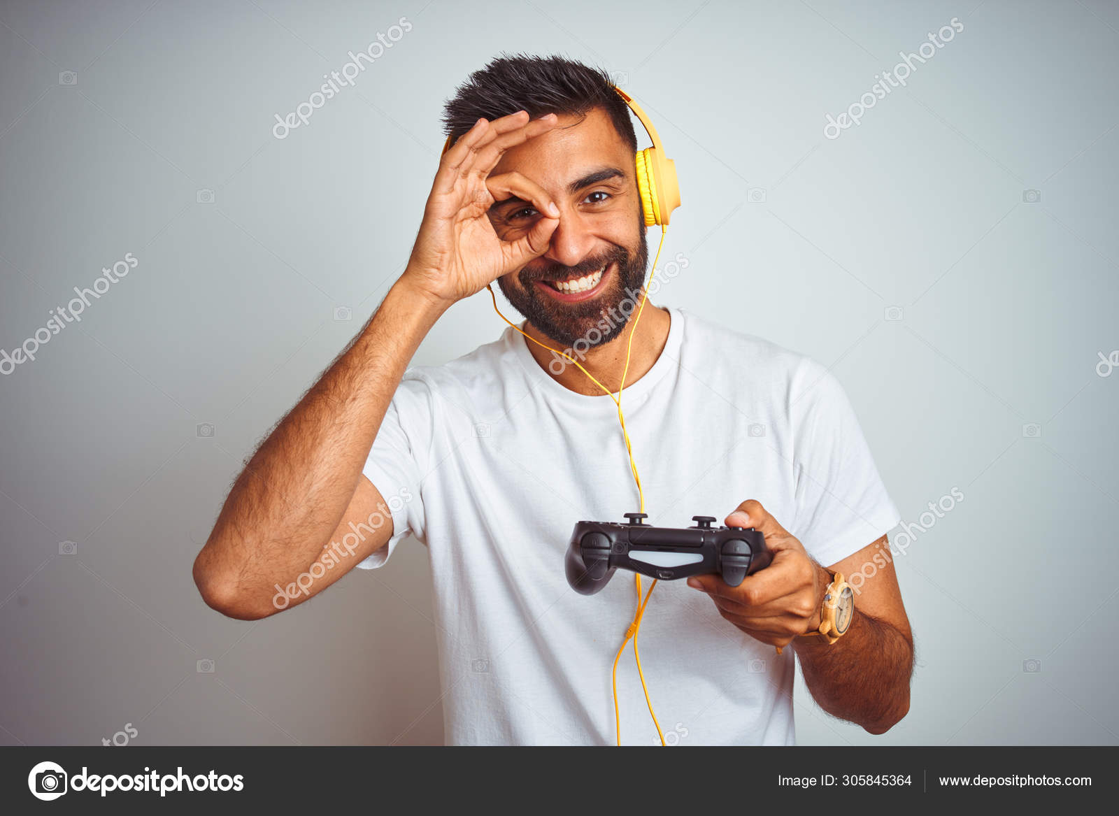 Arab Indian Gamer Man Playing Video Game Using Headphones Isolated ...