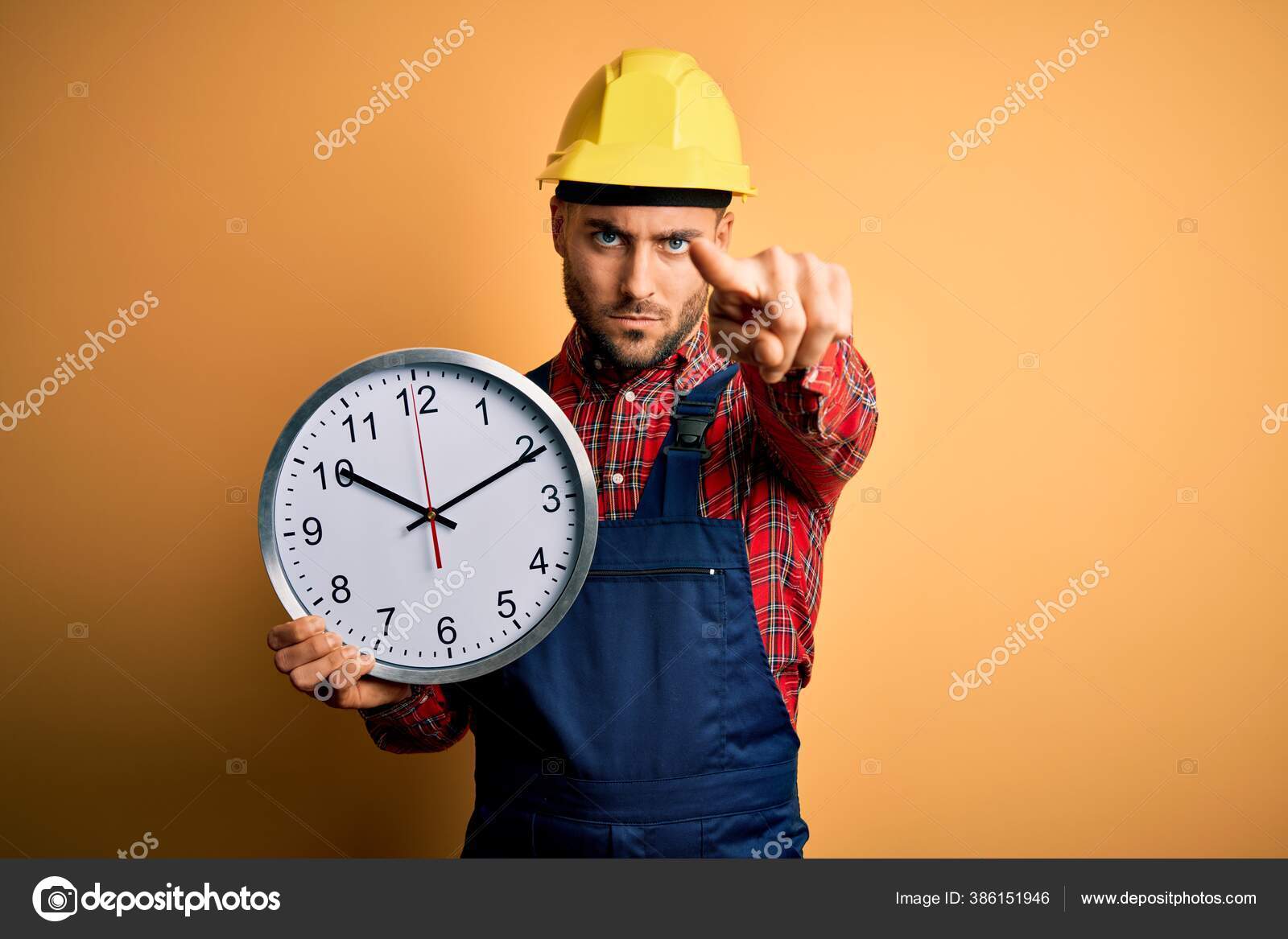 Young Builder Man Wearing Safety Helmet Holding Big Clock Yellow Stock ...