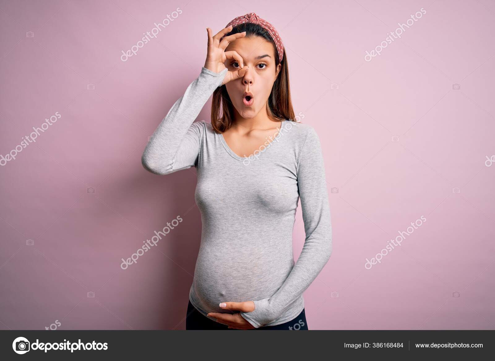 Young Beautiful Teenager Girl Pregnant Expecting Baby Isolated Pink ...