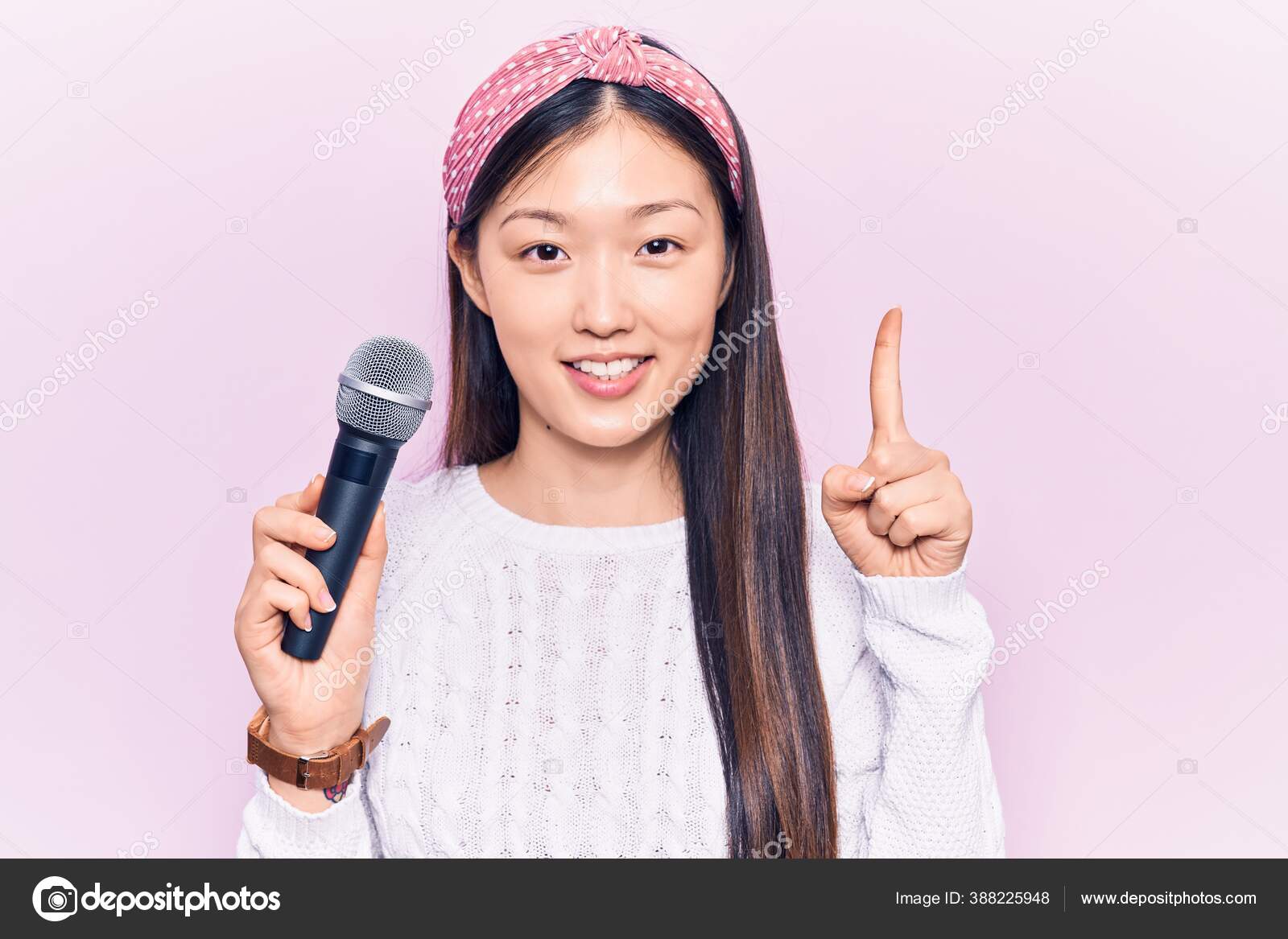 Young Beautiful Chinese Woman Singing Song Using Microphone Smiling ... Young Beautiful Chinese Woman Singing Song Using Microphone Smiling ...