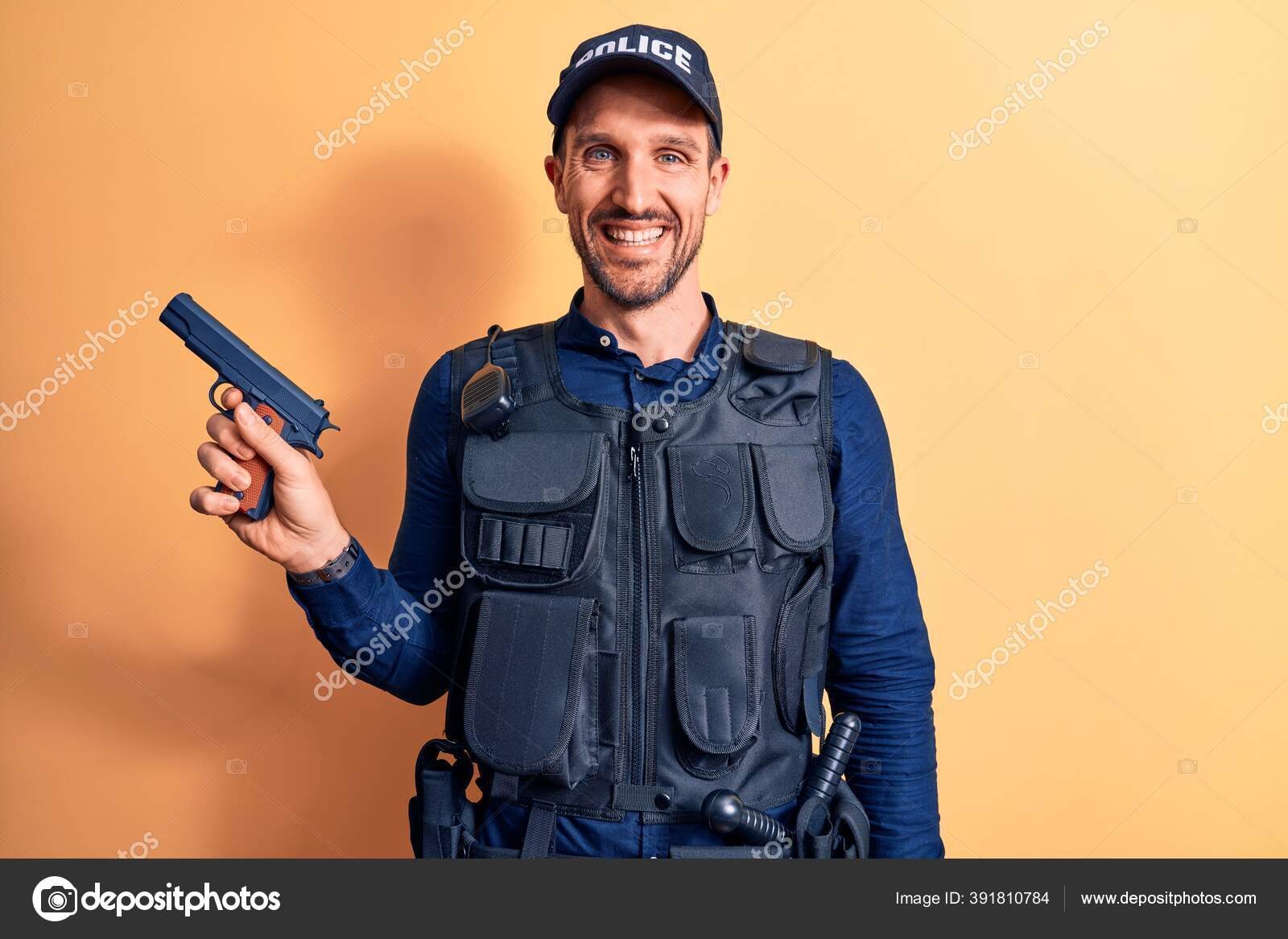 Handsome Policeman Wearing Uniform Bulletprof Holding Gun Yellow ...