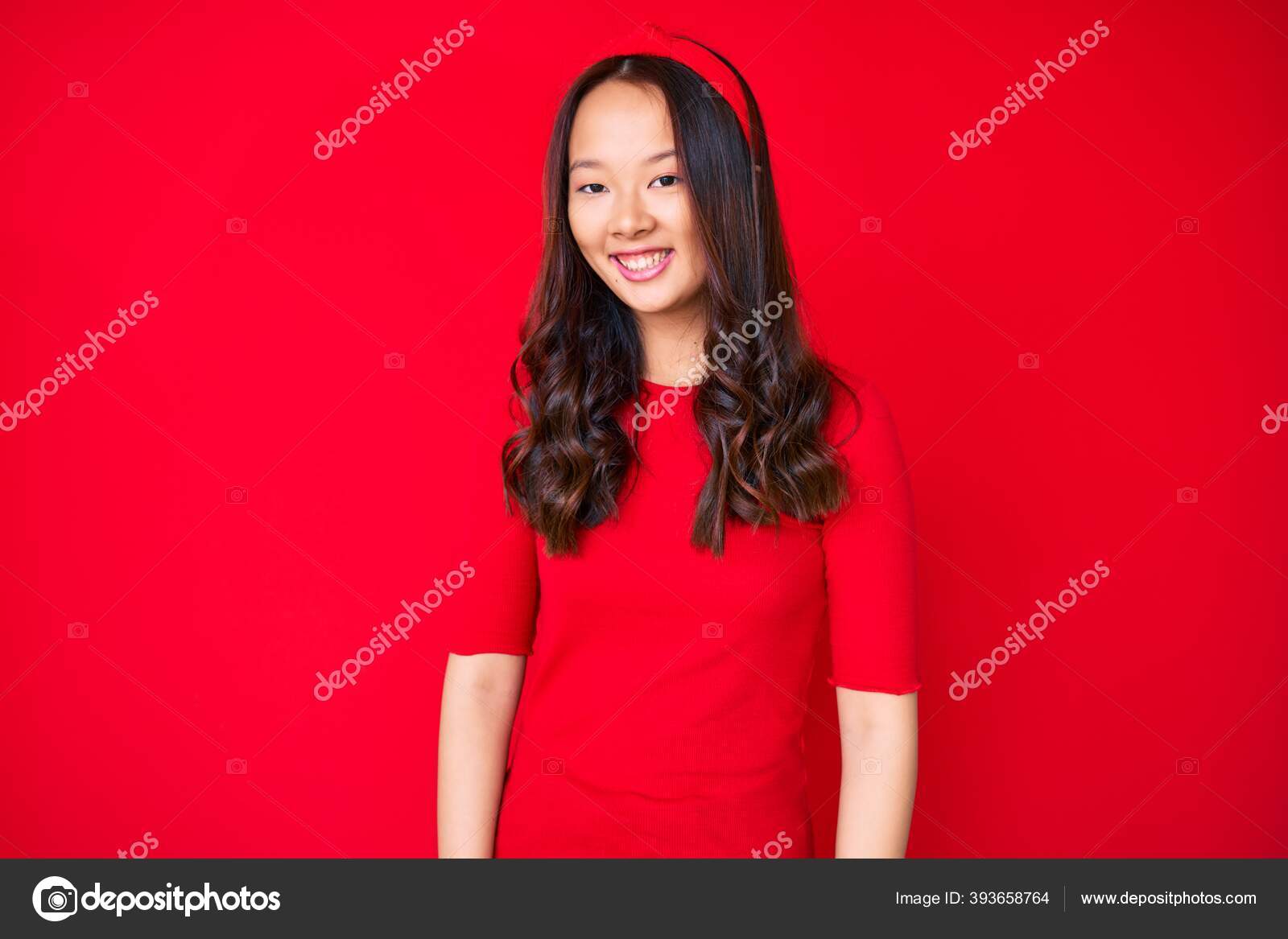 Young Beautiful Chinese Girl Wearing Casual Clothes Happy Cool Smile