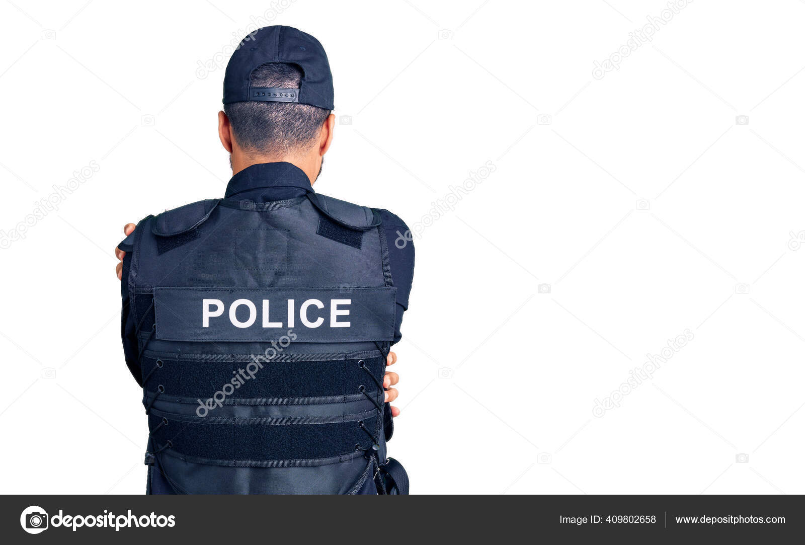 Young Hispanic Man Wearing Police Uniform Hugging Oneself Happy ...