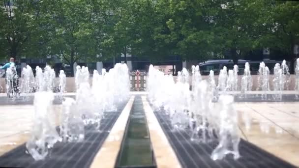 Urban water fountain waterfall granite stone. Refreshing splash in ...