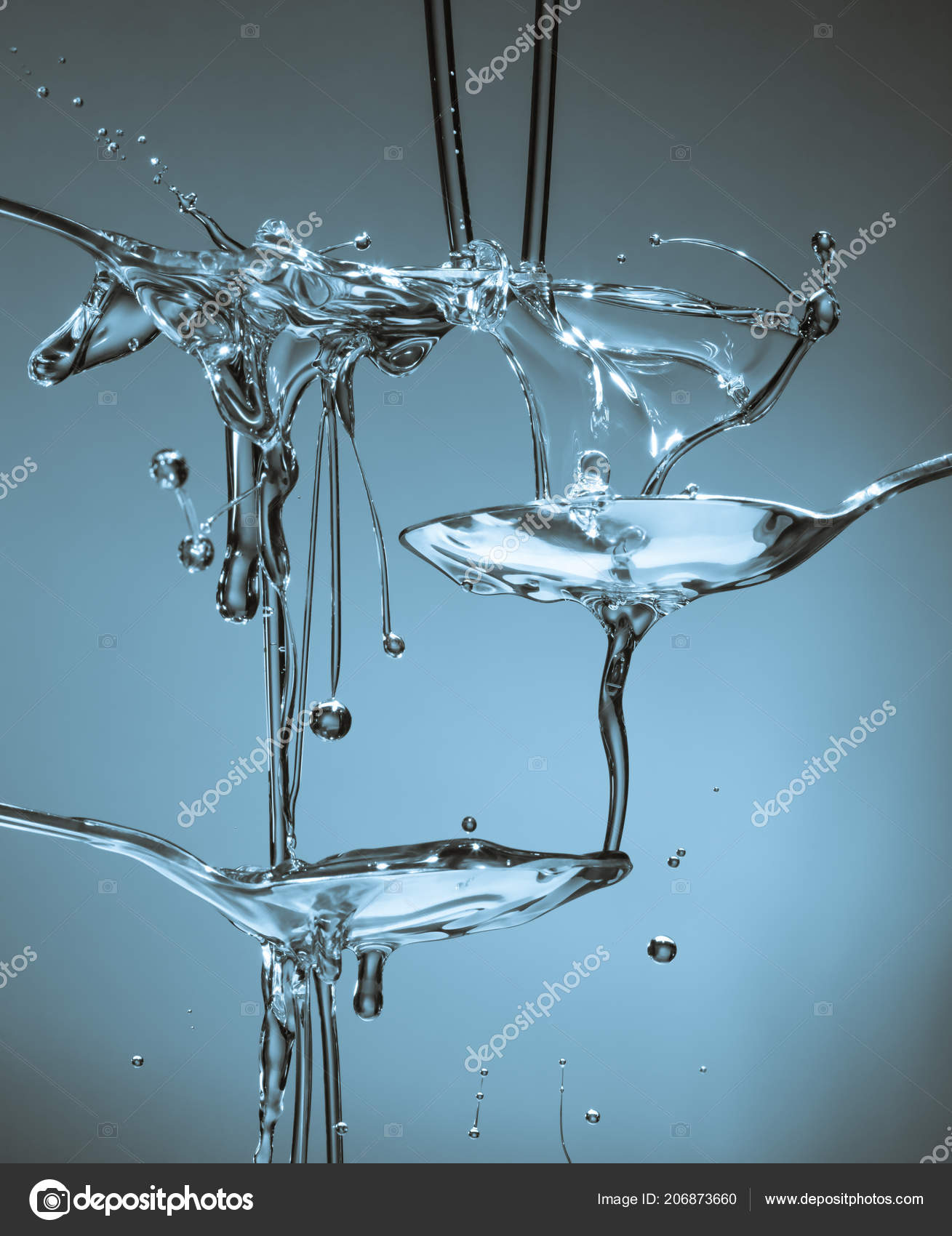 Pouring Oil Splash Spoons Blue Background Studio Shooting Stock Photo ...