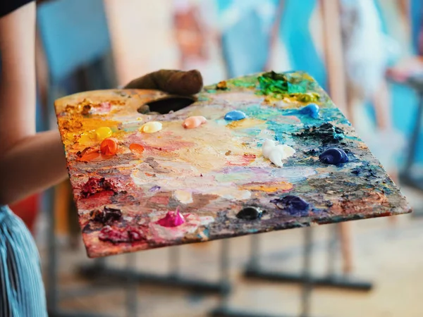 Hand Mixing Paint On Palette — Stock Photo © racorn #26899299