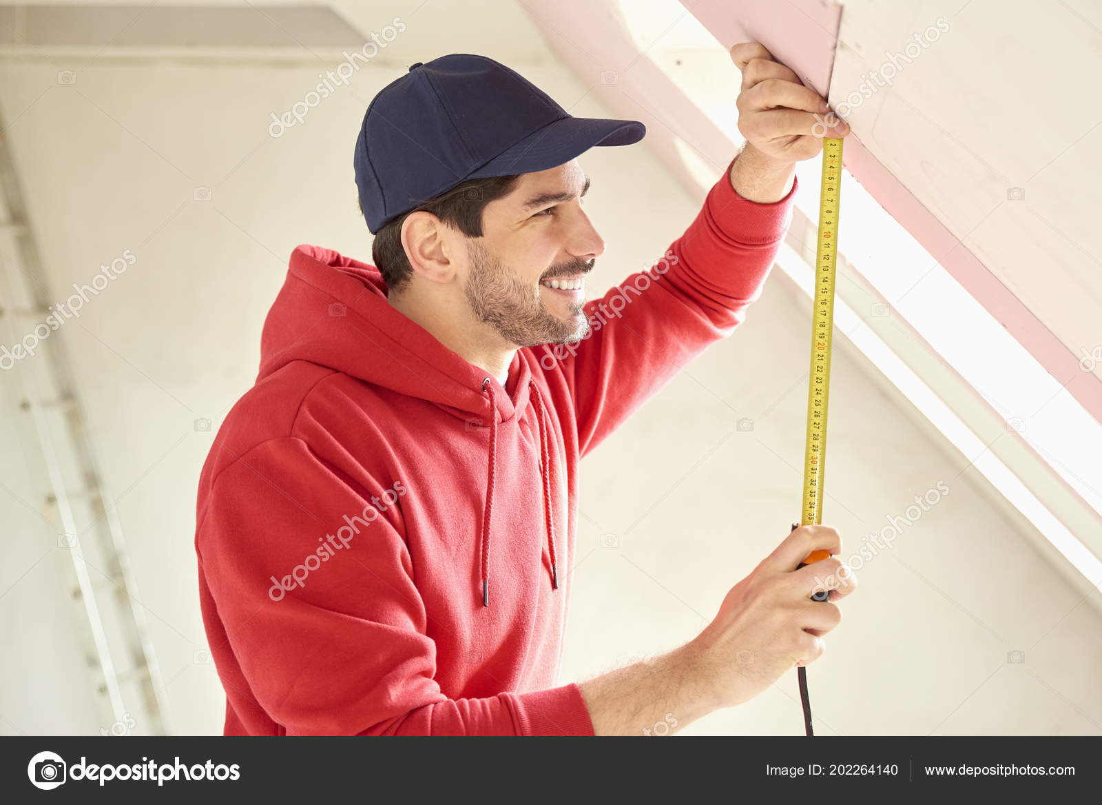 Portrait Young Man Using Measuring Tape While Working Construction Site ...