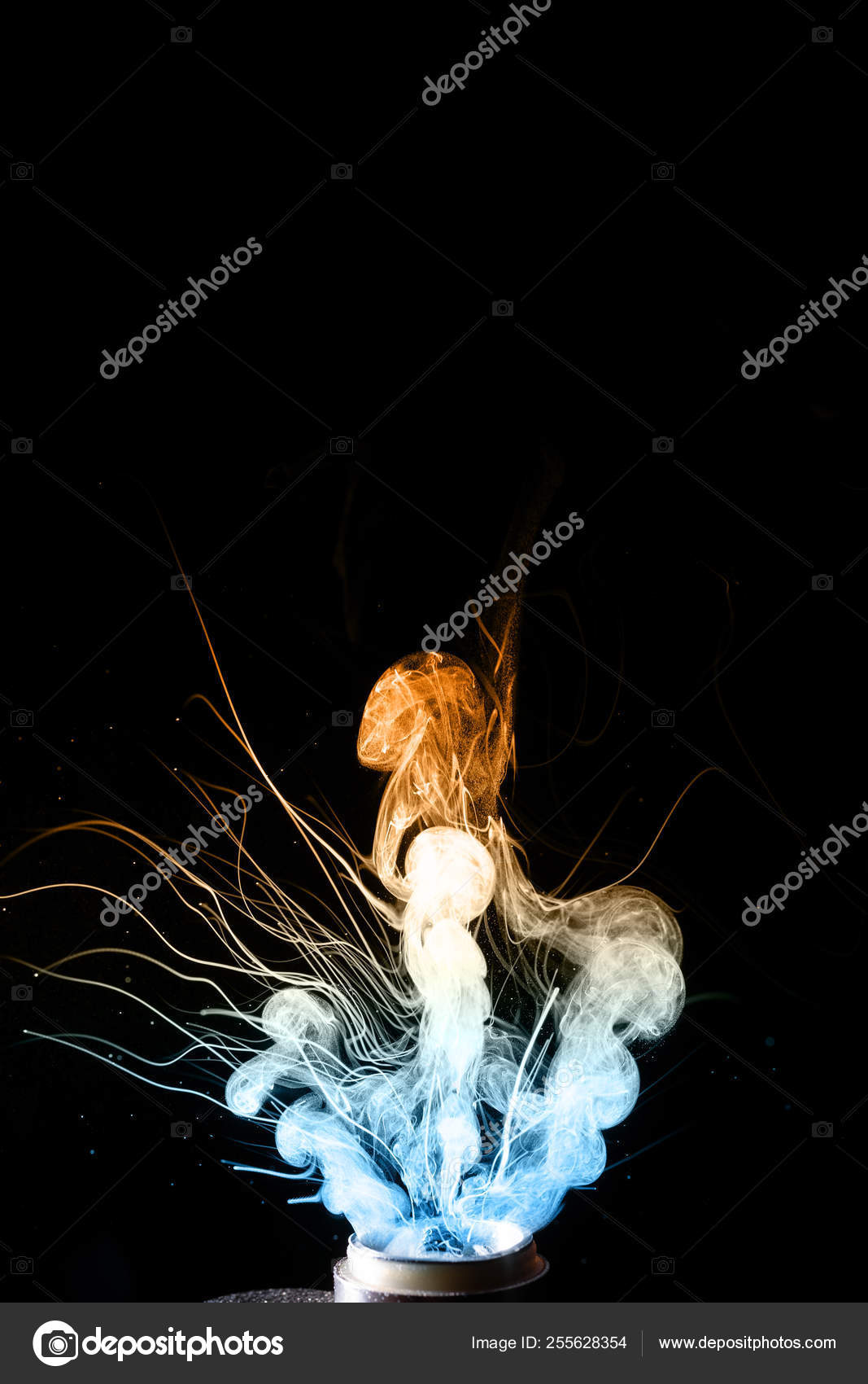 Vape clouds splash on black background. Two colours fog is blue and ...