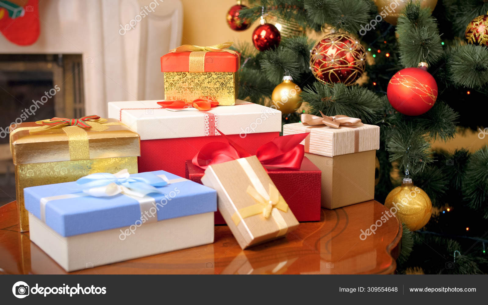 Beautiful image of lots of presents and gifts for Christmas lying on ...