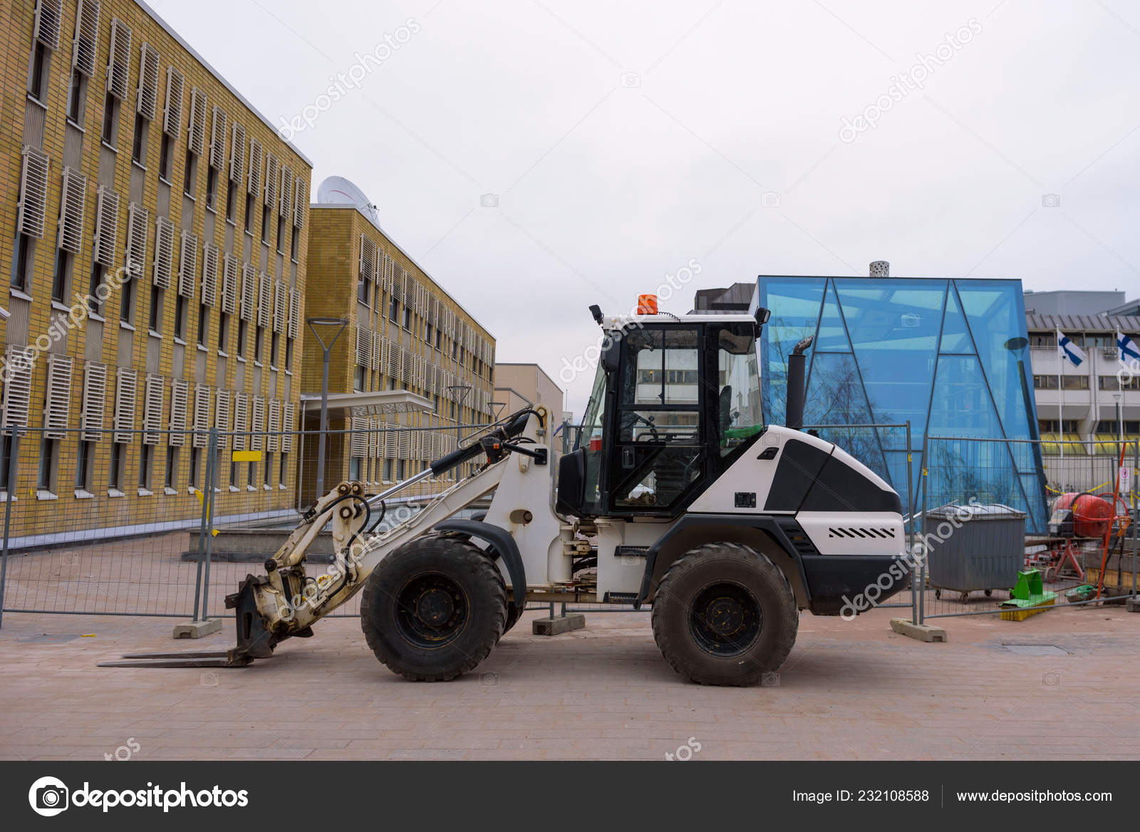 Tractor manipulator stands in the city near the construction site Stock ...