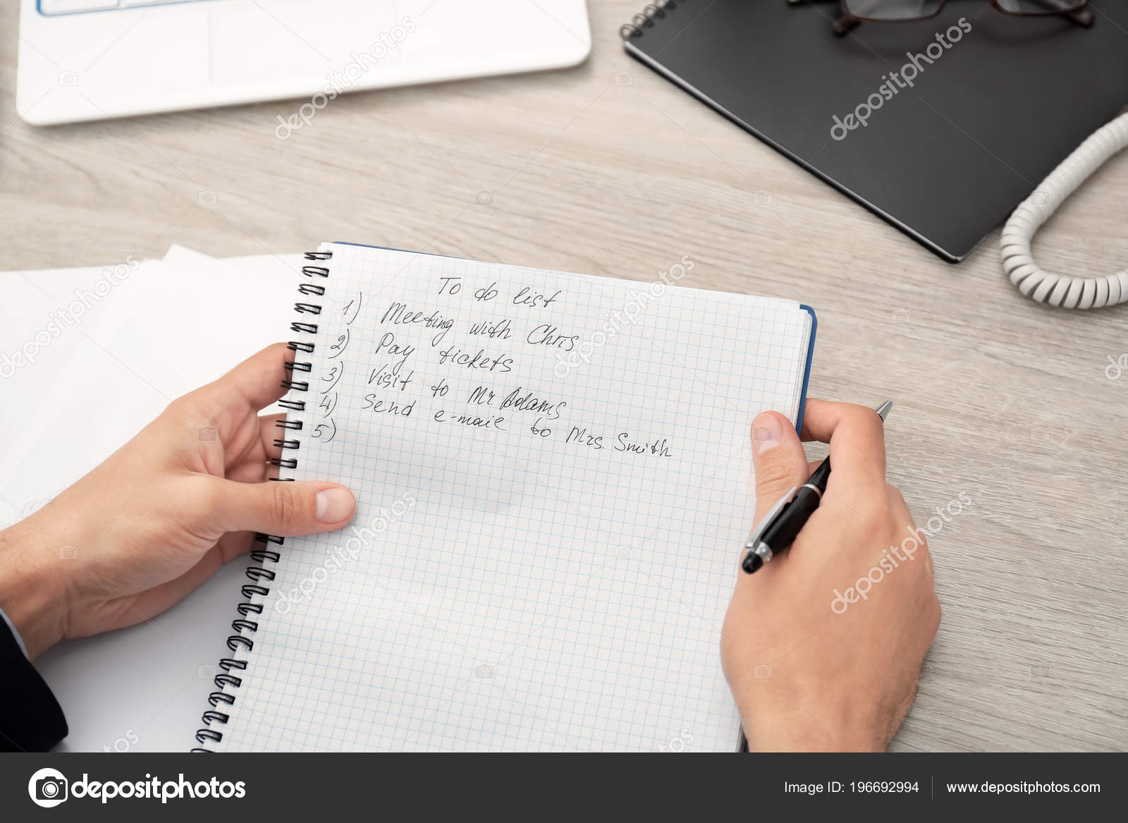 Man Making List While Sitting Table Closeup Stock Photo by ©serezniy ...