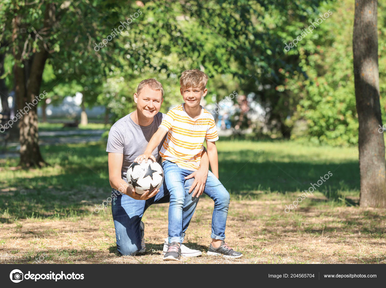 Happy Father Son Soccer Ball Park — Stock Photo © serezniy #204565704