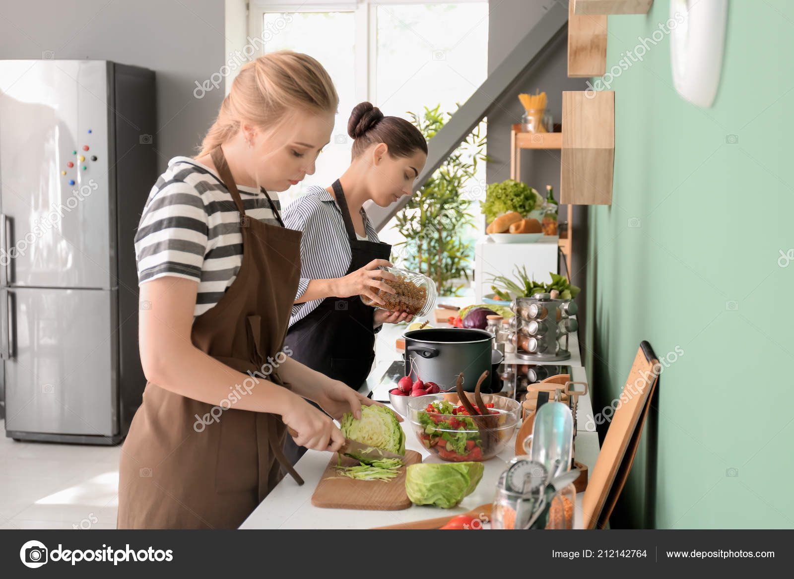 Friends Cooking Together Kitchen Stock Photo by ©serezniy 212142764