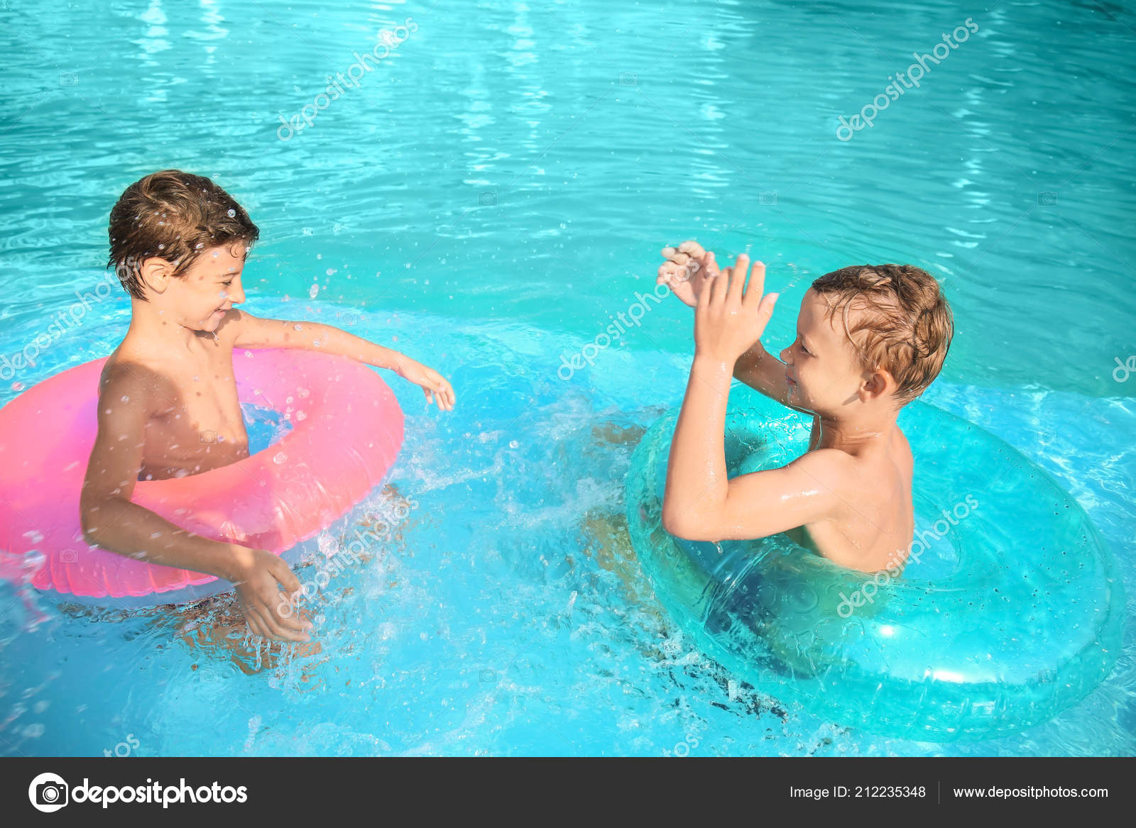 Cute Boys Playing While Swimming Pool Summer Day Stock Photo by ...