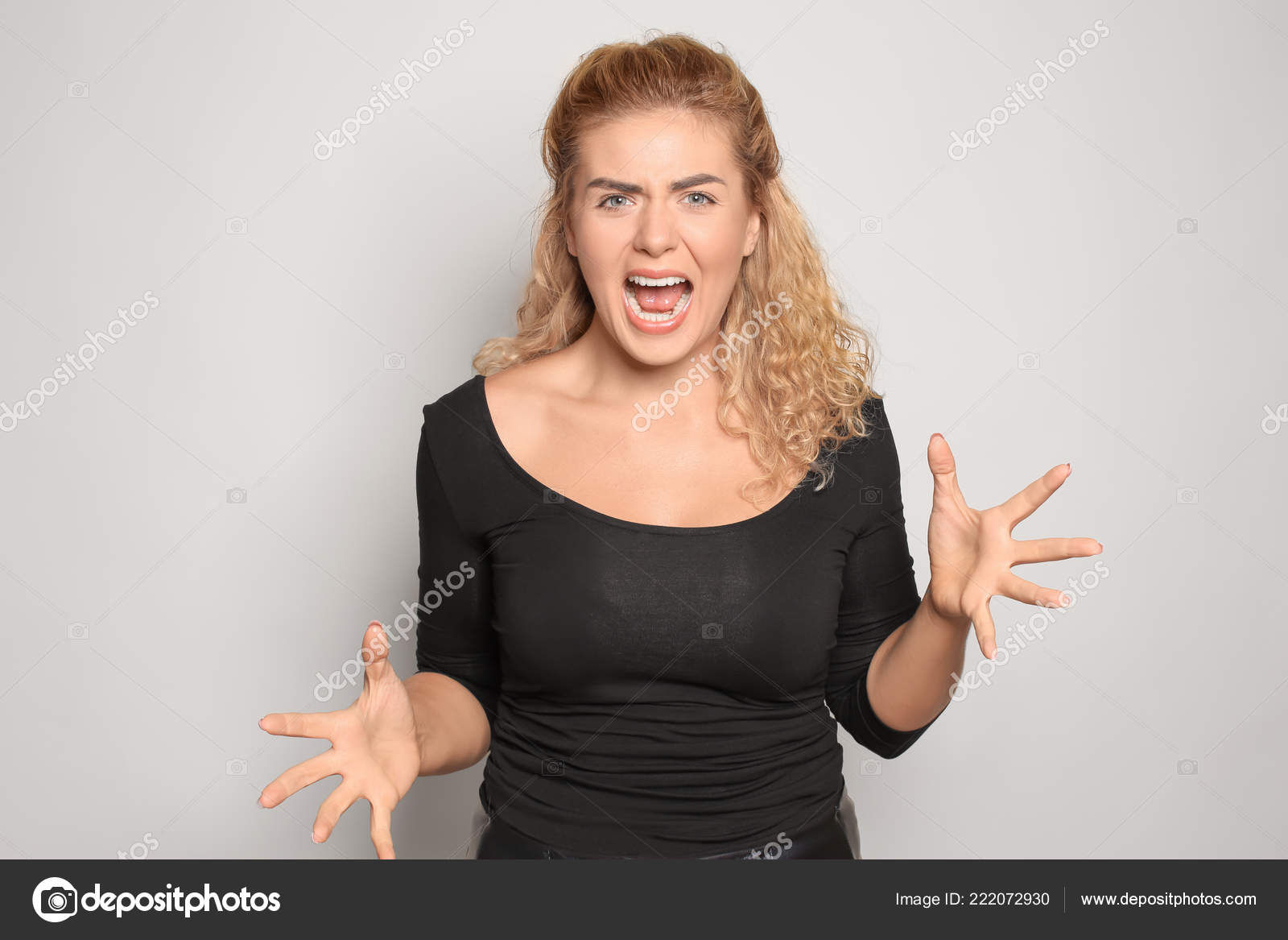 Portrait Angry Young Woman Light Background — Stock Photo © serezniy ...