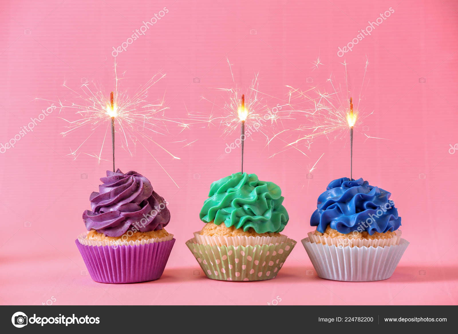 Tasty Cupcakes Sparklers Color Background — Stock Photo © serezniy #224782200
