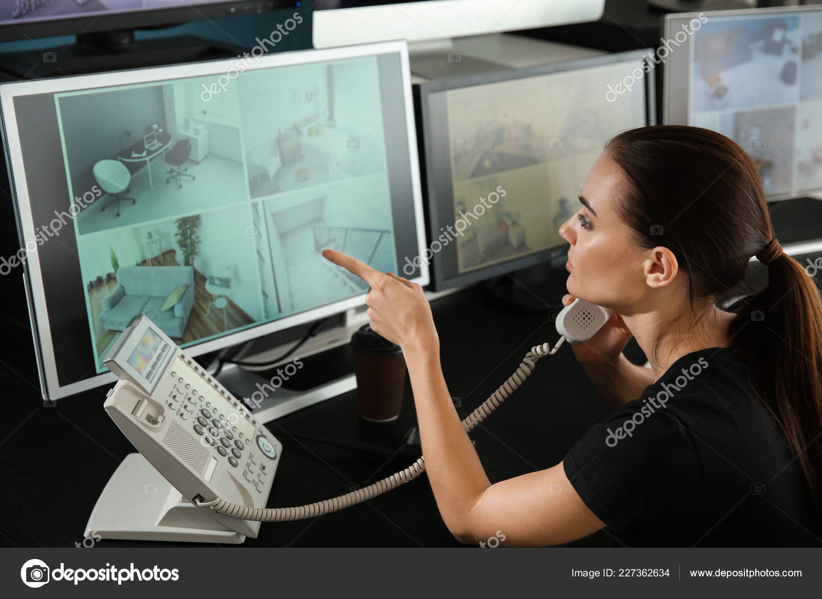 Security Guard Talking Phone While Monitoring Modern Cctv Cameras ...