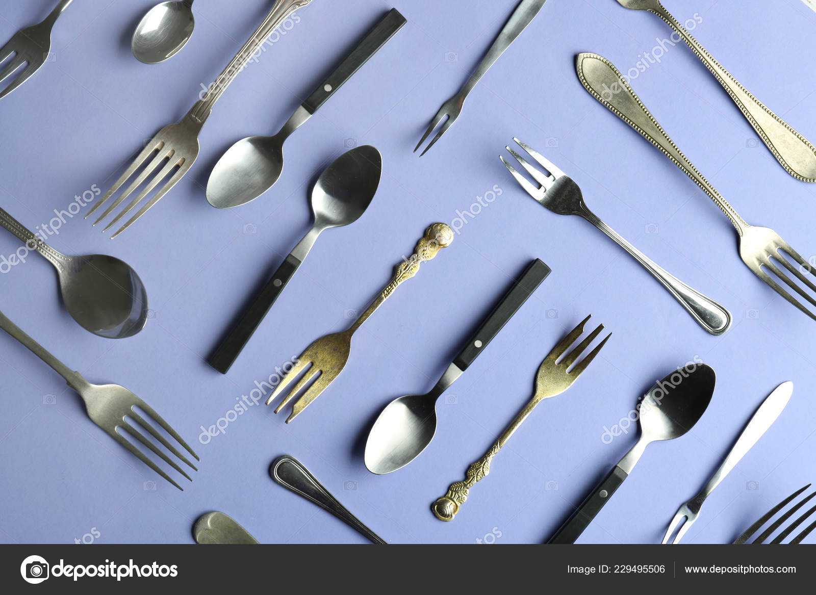 Spoons Forks Color Background Stock Photo by ©serezniy 229495506