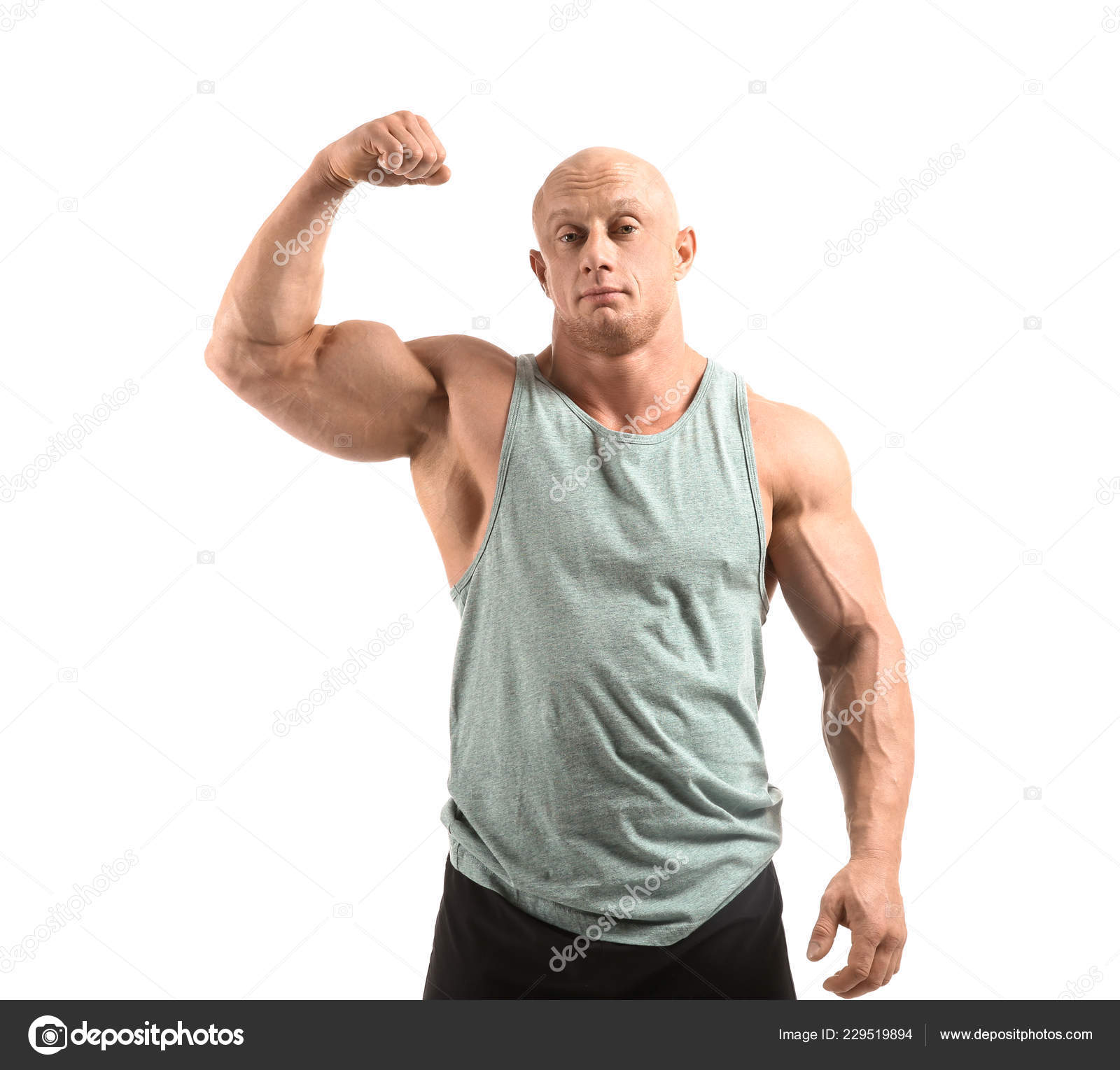 Muscular Bodybuilder White Background Stock Photo by ©serezniy 229519894