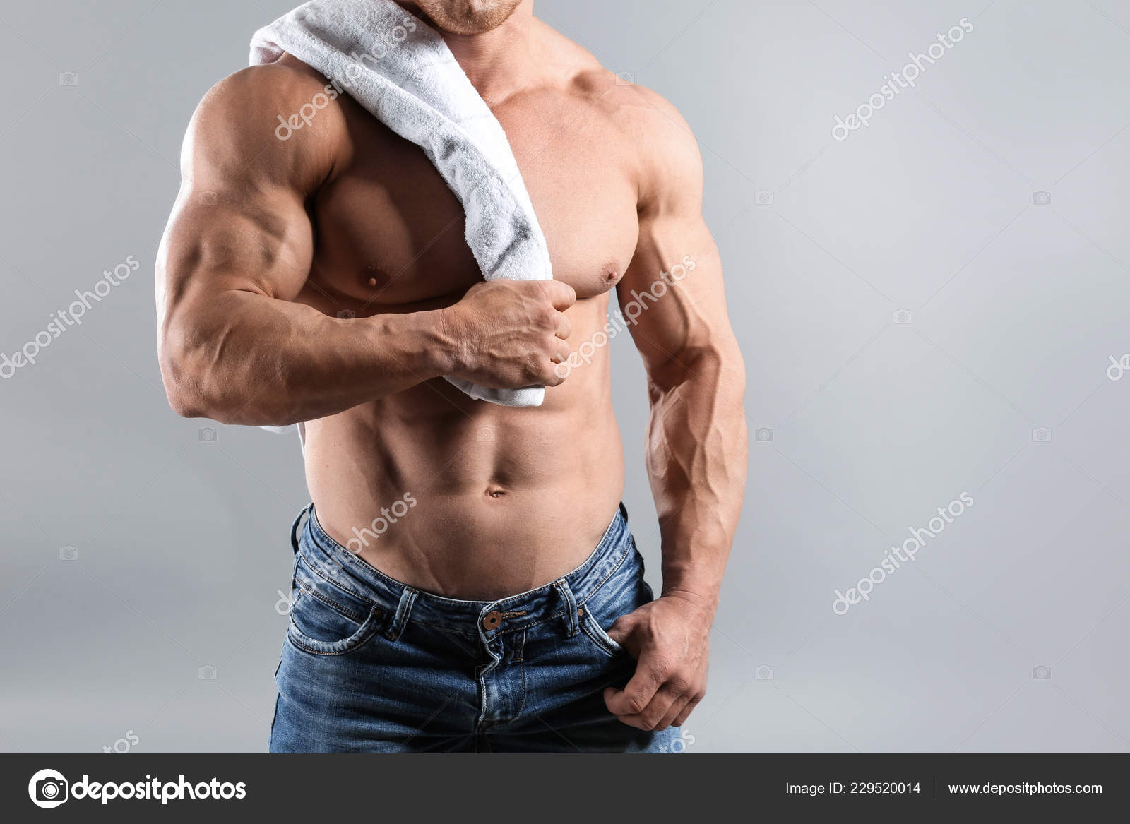 Muscular Bodybuilder Grey Background — Stock Photo © serezniy #229520014