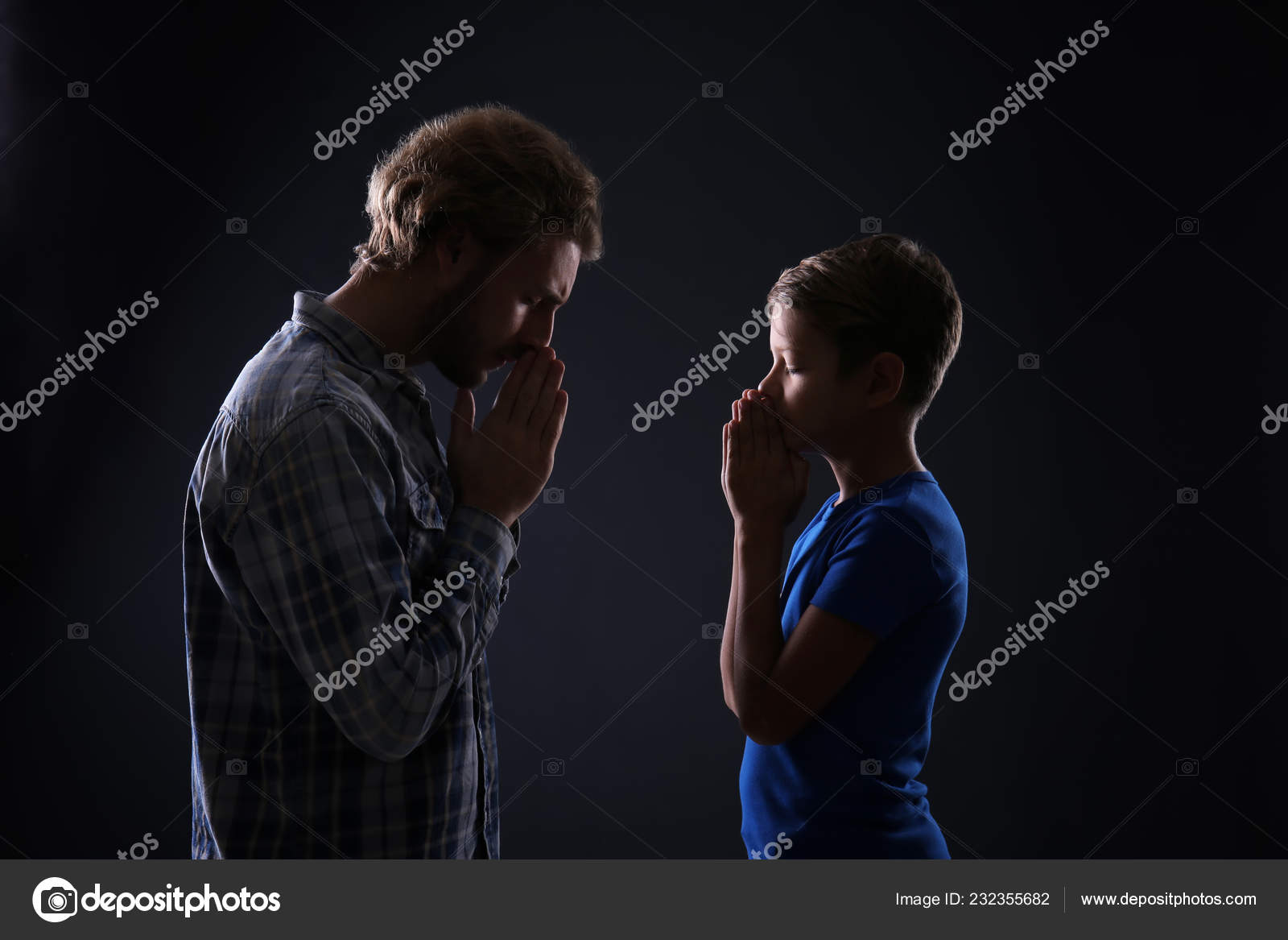 Praying Father Son Dark Background Stock Photo by ©serezniy 232355682