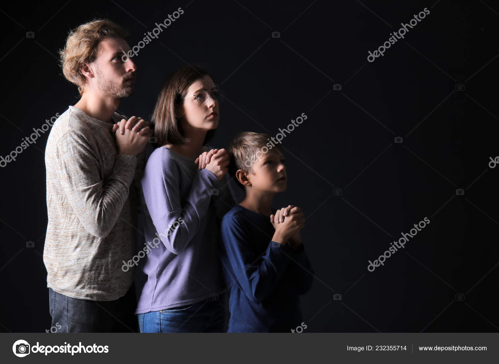 Praying Family Dark Background Stock Photo by ©serezniy 232355714