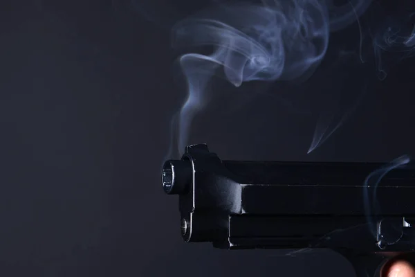 Silhouette Smoking Pistol Dark Background — Stock Photo © serezniy ...