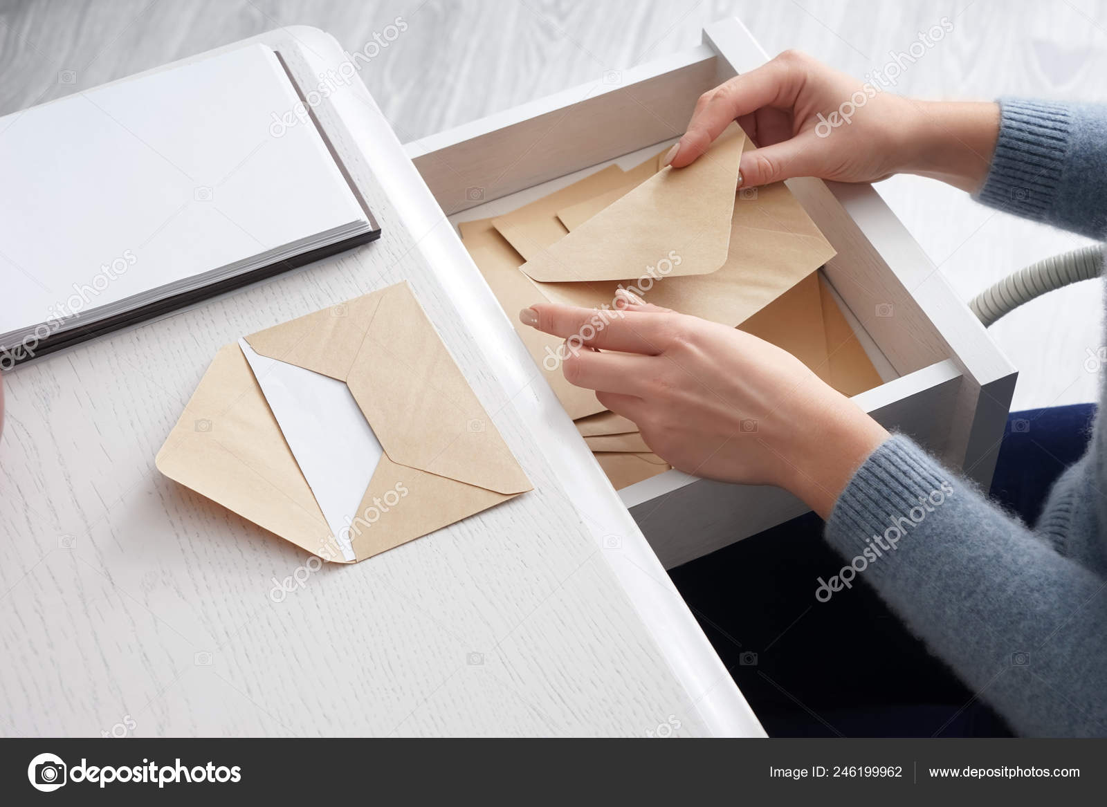Young Woman Taking Envelope Table Drawer — Stock Photo © serezniy ...