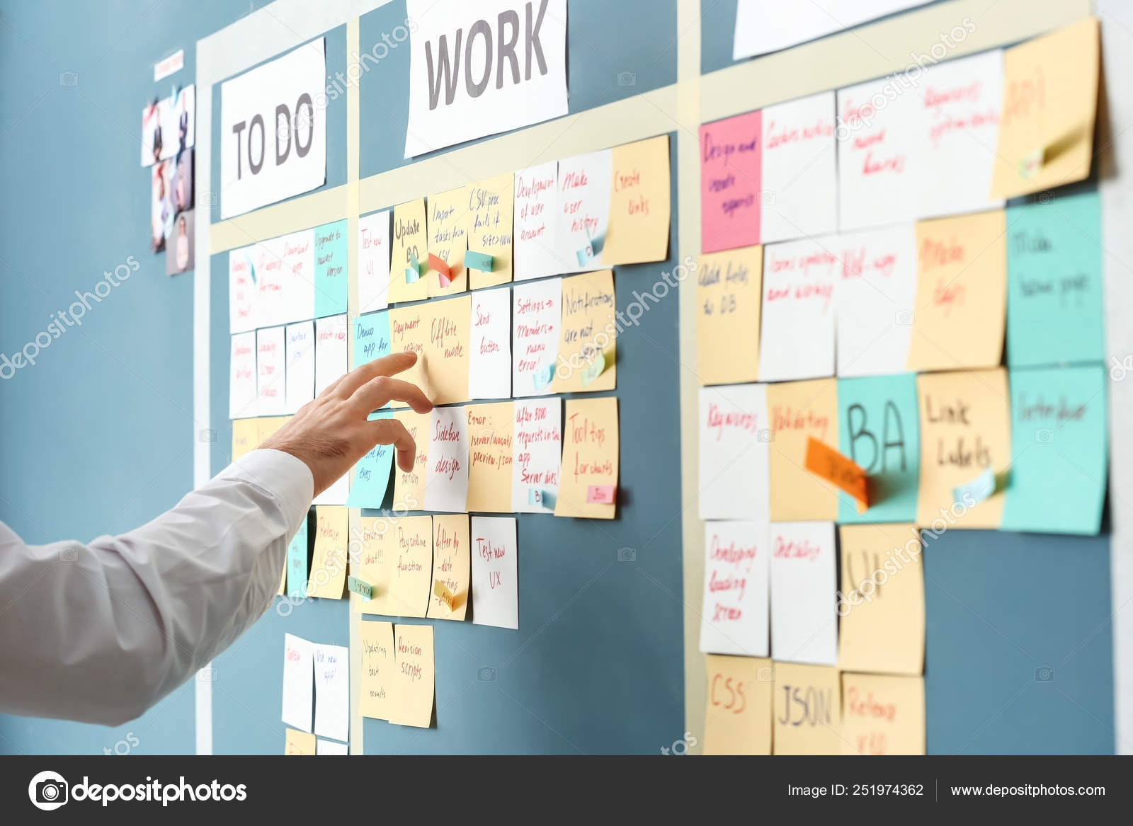 Young man near scrum task board in office — Stock Photo © serezniy ...