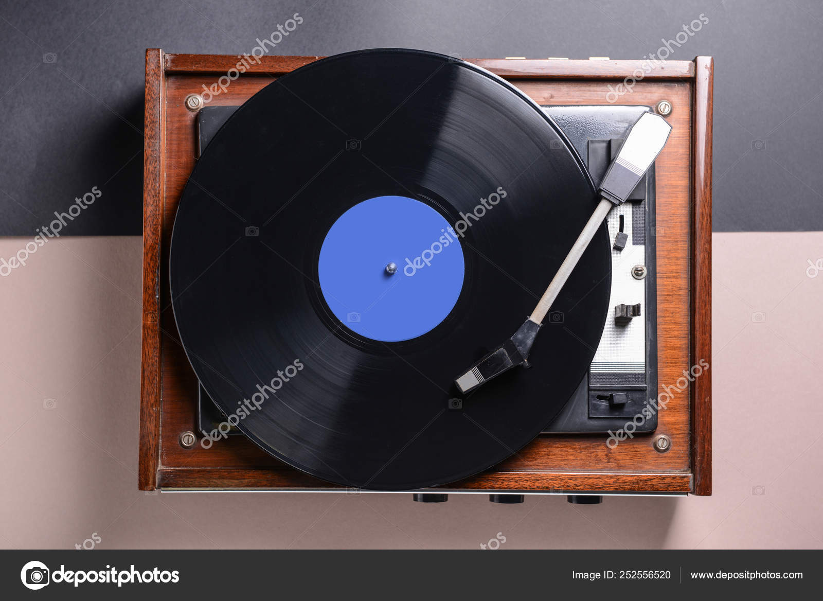 Record player with vinyl disc on table Stock Photo by ©serezniy 252556520