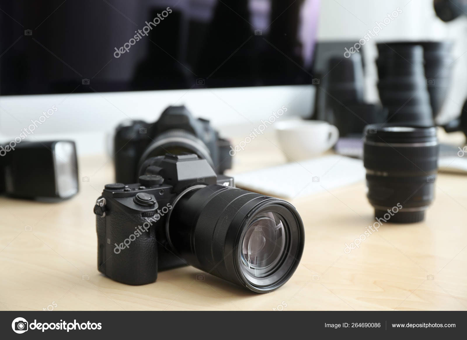 Professional photo camera on table Stock Photo by ©serezniy 264690086