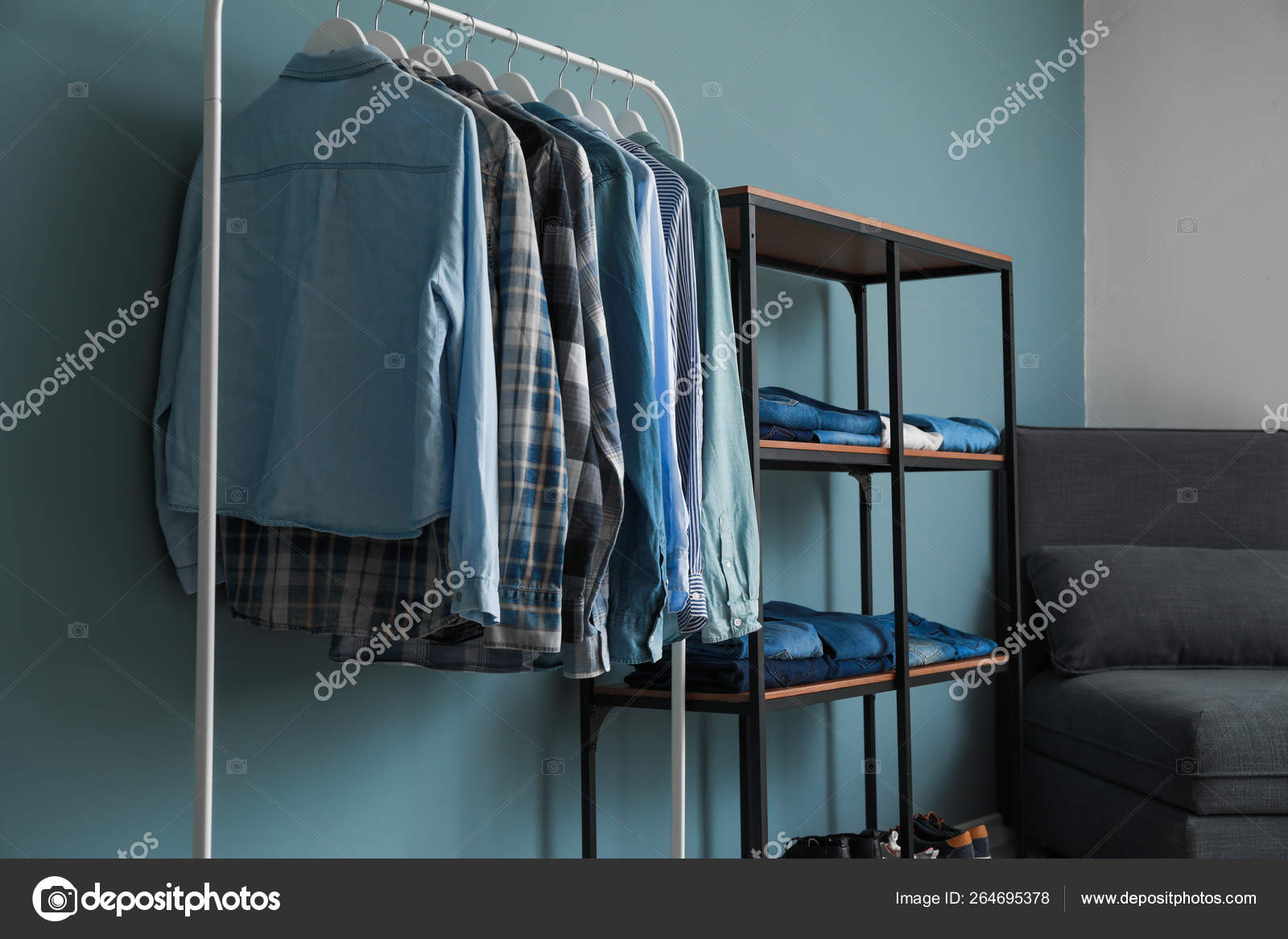 Rack with stylish clothes in dressing room — Stock Photo © serezniy ...