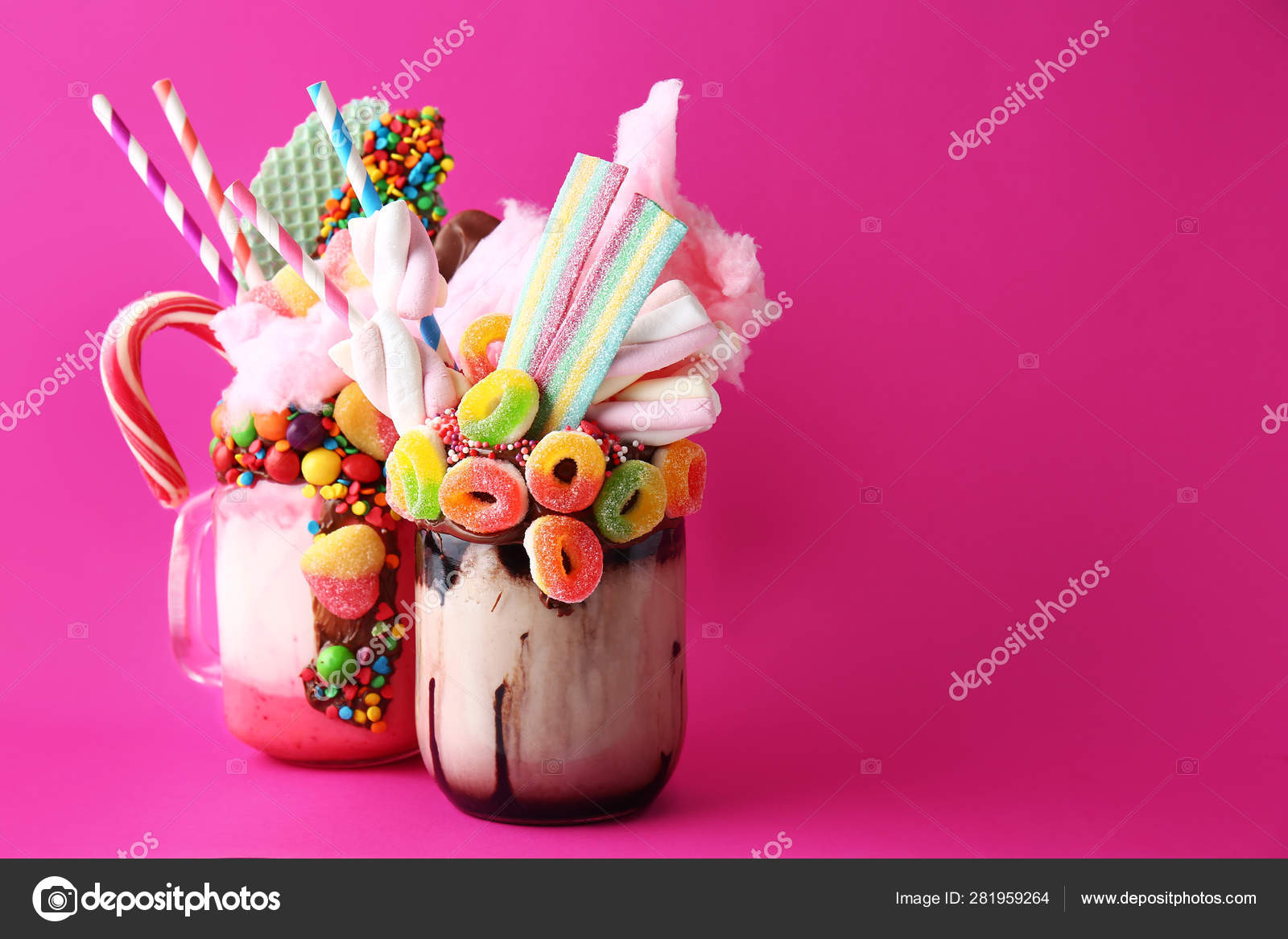 Different delicious freak shakes on color background Stock Photo by ...