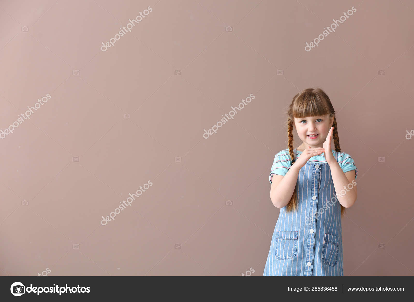 Cute deaf mute girl using sign language on color background — Stock ...
