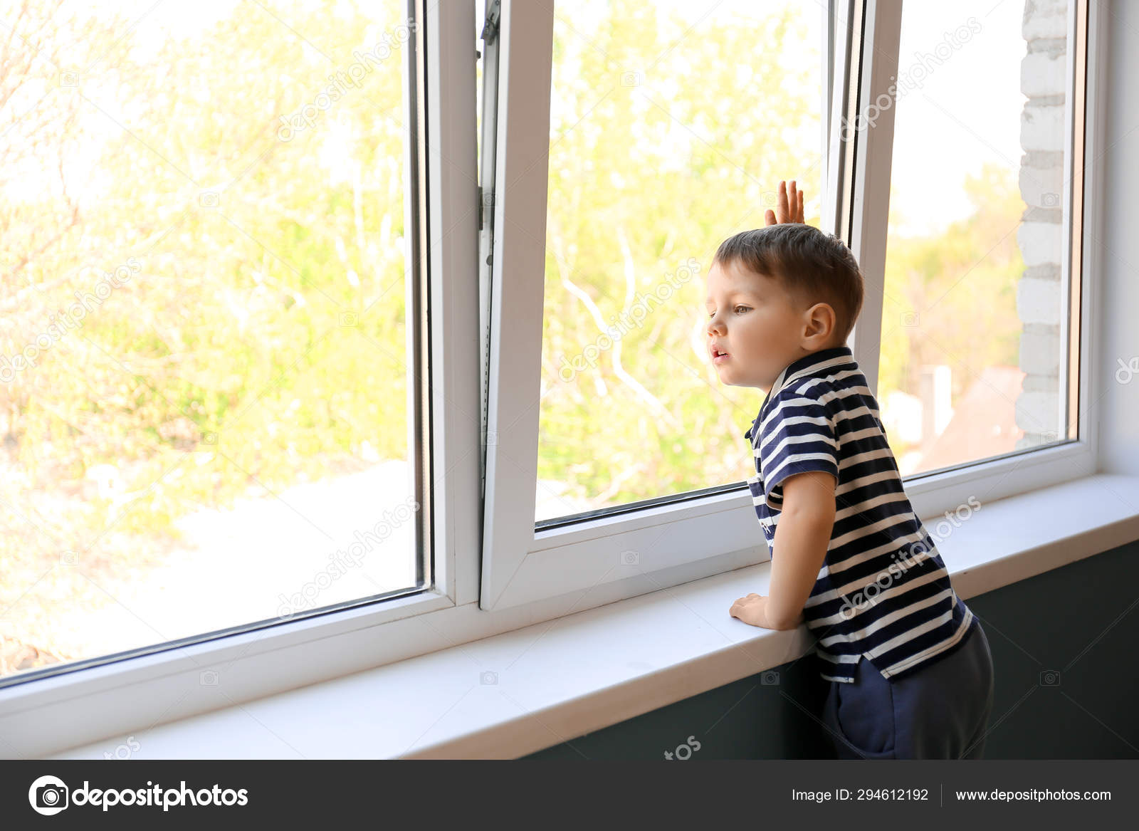 Little boy with autistic disorder near window at home — Stock Photo ...