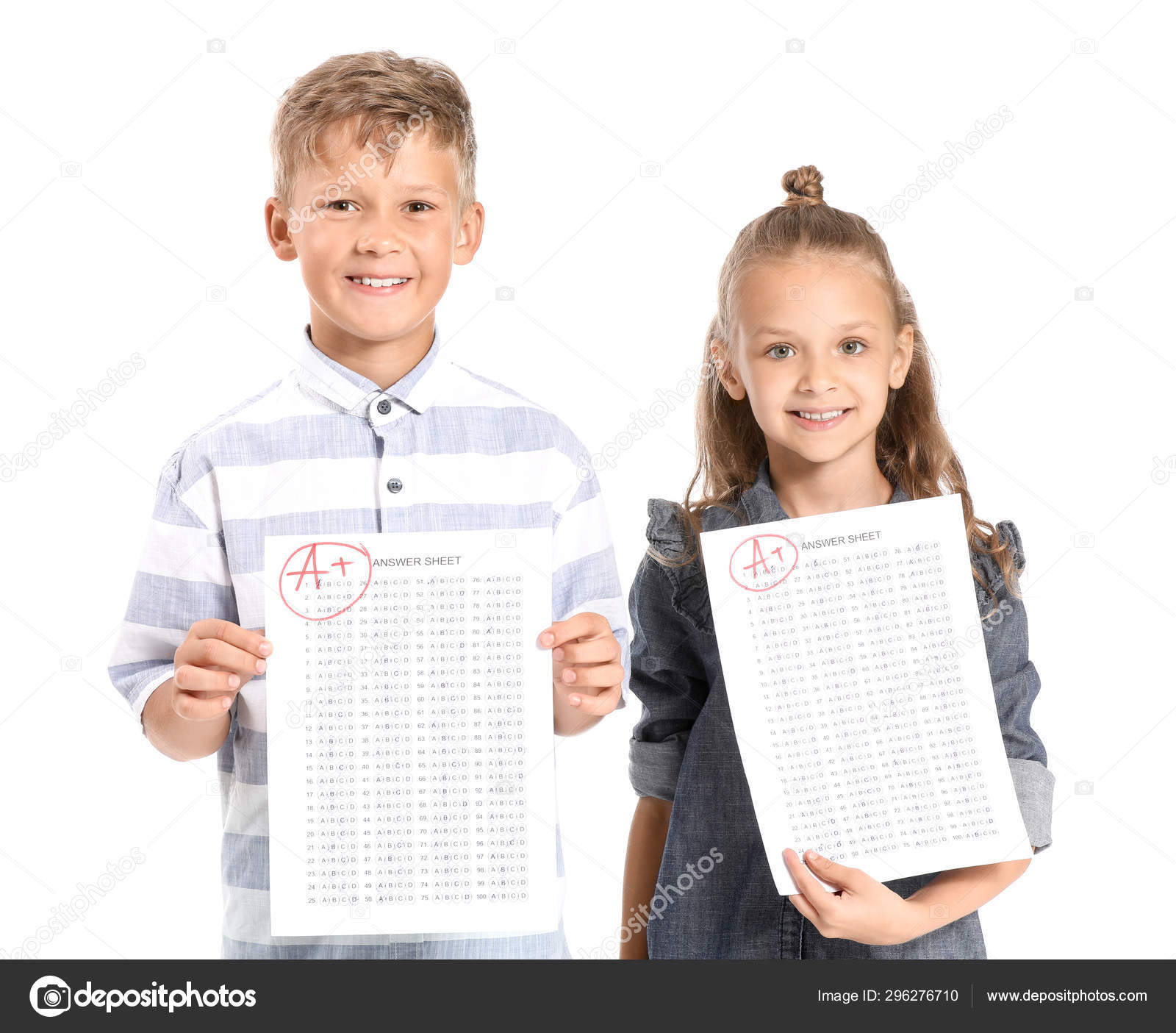 Happy children with answer sheets for school test on white background ...