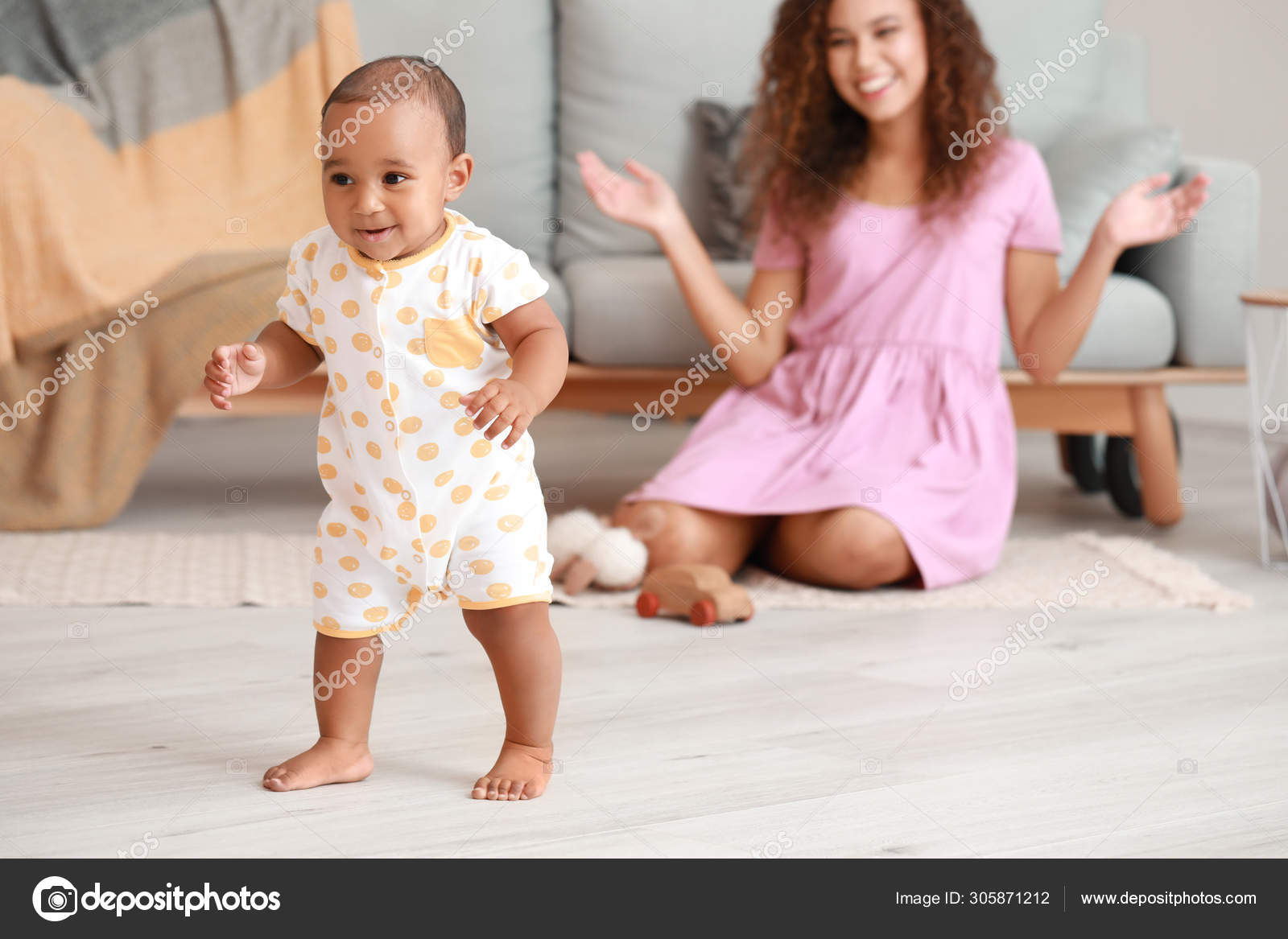 Cute little baby learning to walk at home Stock Photo by ©serezniy ...