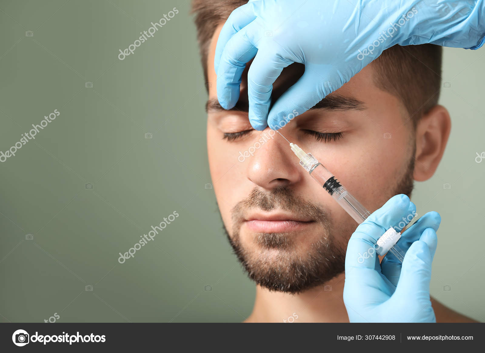 Handsome man receiving filler injection on color background — Stock ...
